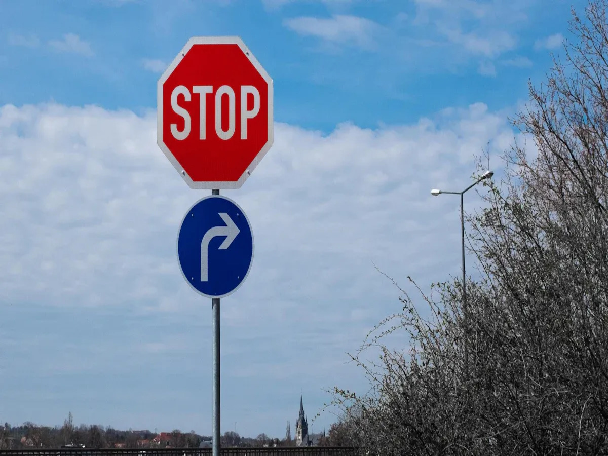 Shift from Text-Heavy to Symbol-Dominant Road Sign Language