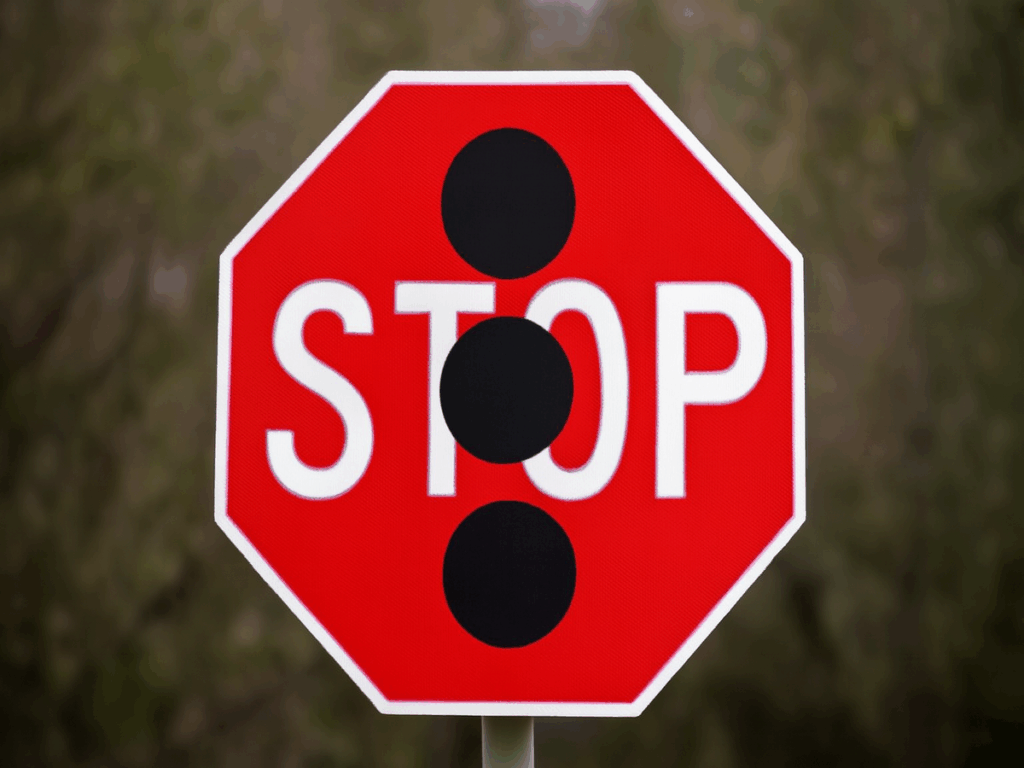 Stop Sign with Three Black Dots and Color Blindness