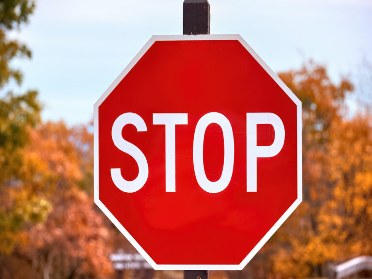 Why Traffic STOP Signs Are Rare in UK: British Road Sign Strategy